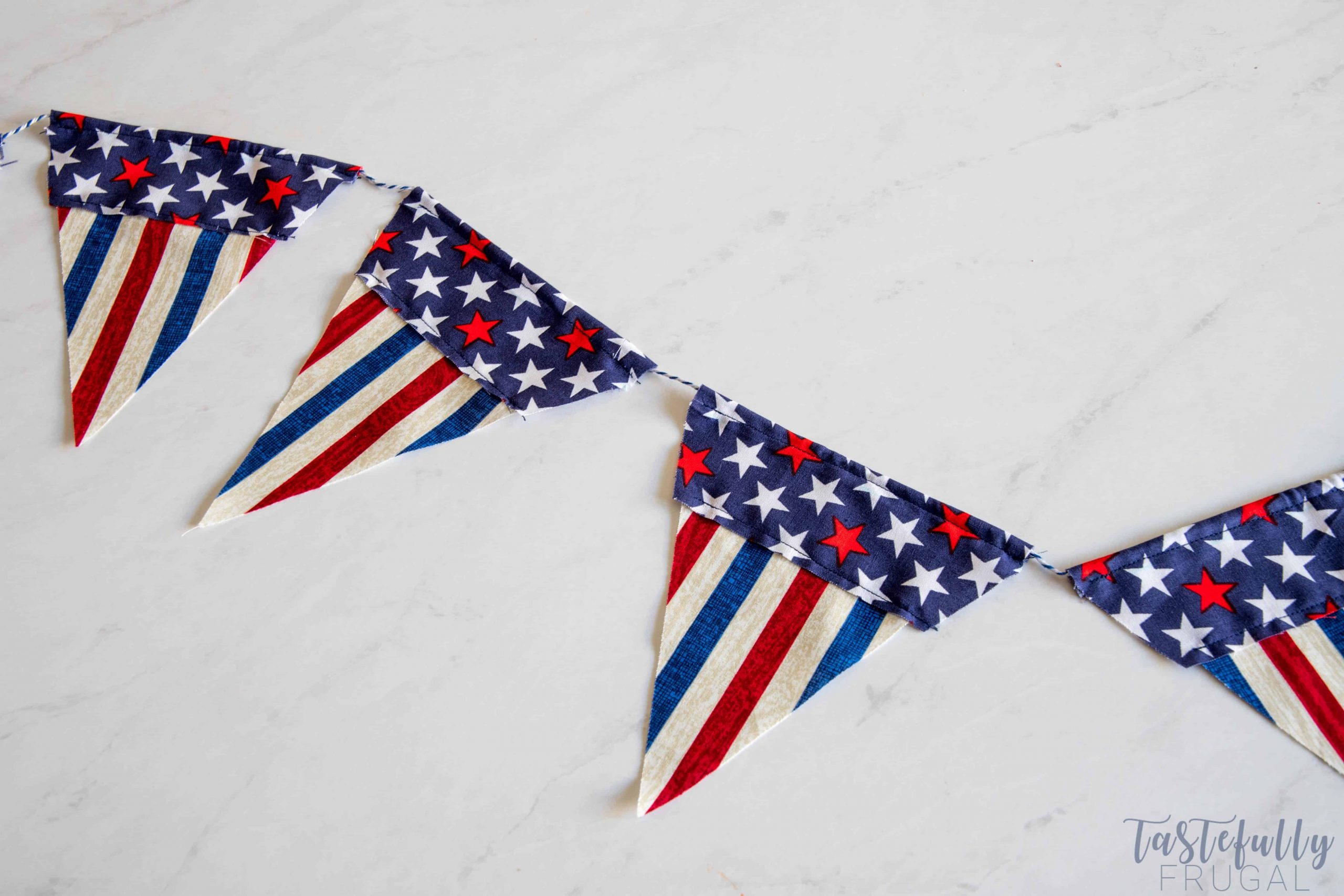 DIY Fabric Pennant Banner Tastefully Frugal